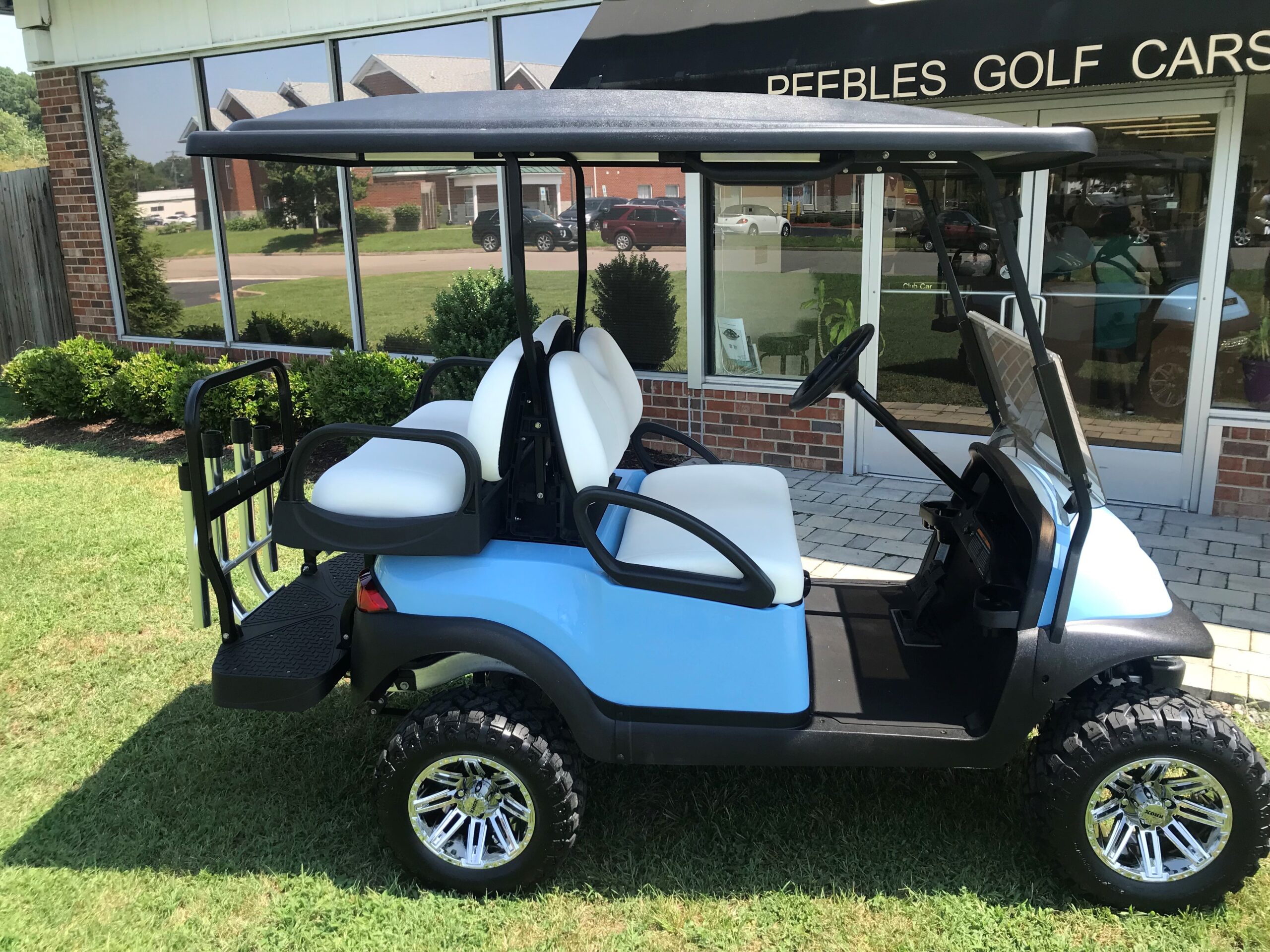2017 Club Car Lifted Electric 4-pass Golf Car- Sky Blue | Peebles Golf Cars