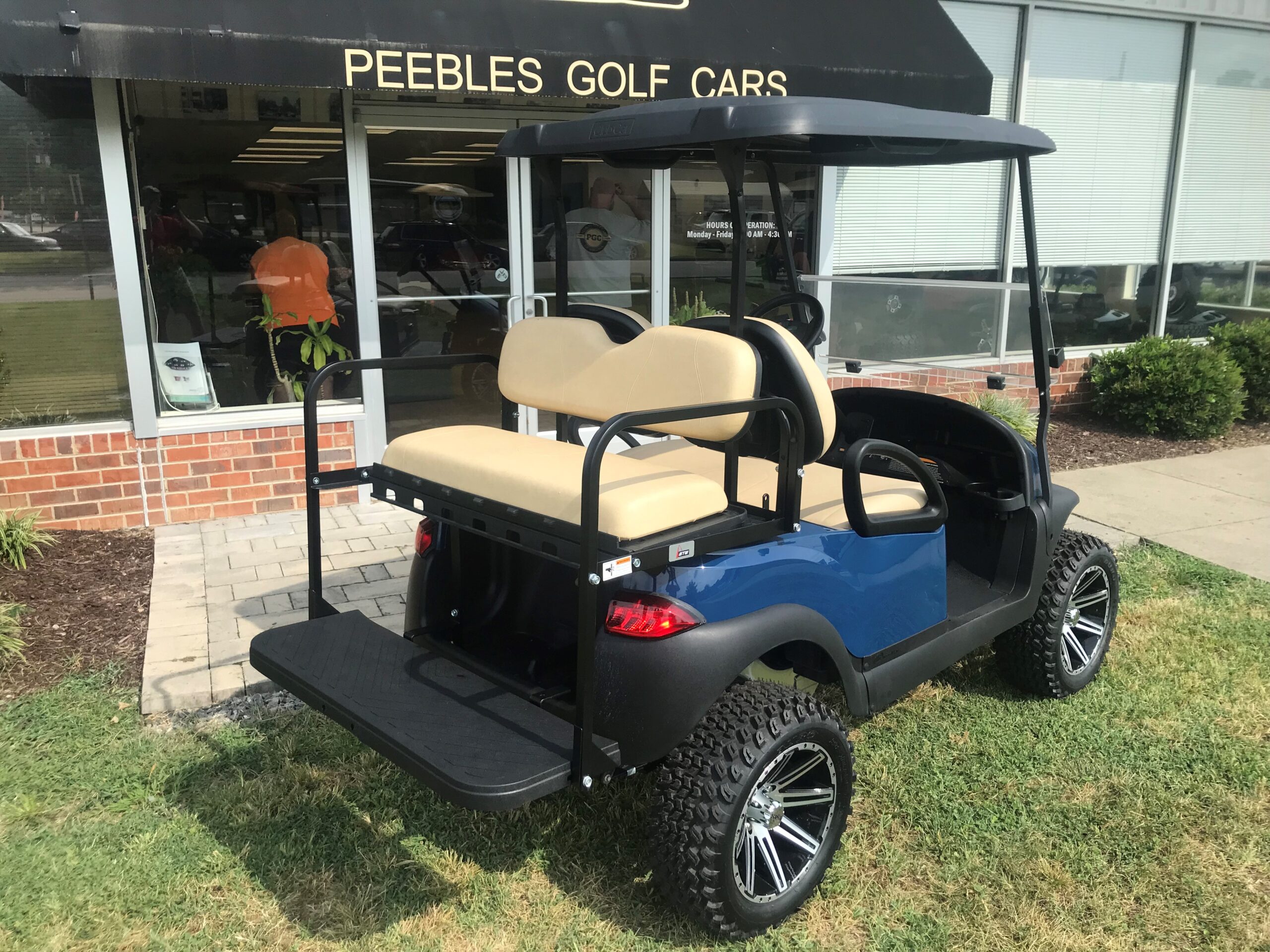 2018 Club Car Lifted Electric 4-pass Golf Car- Blue | Peebles Golf Cars